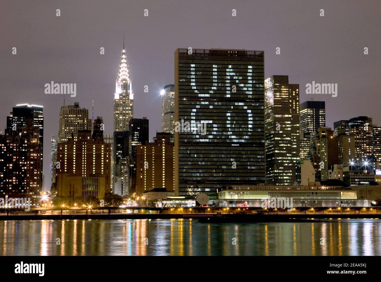 "A ""UN 60"" sign lights up the United Nations Headquarters building in ...