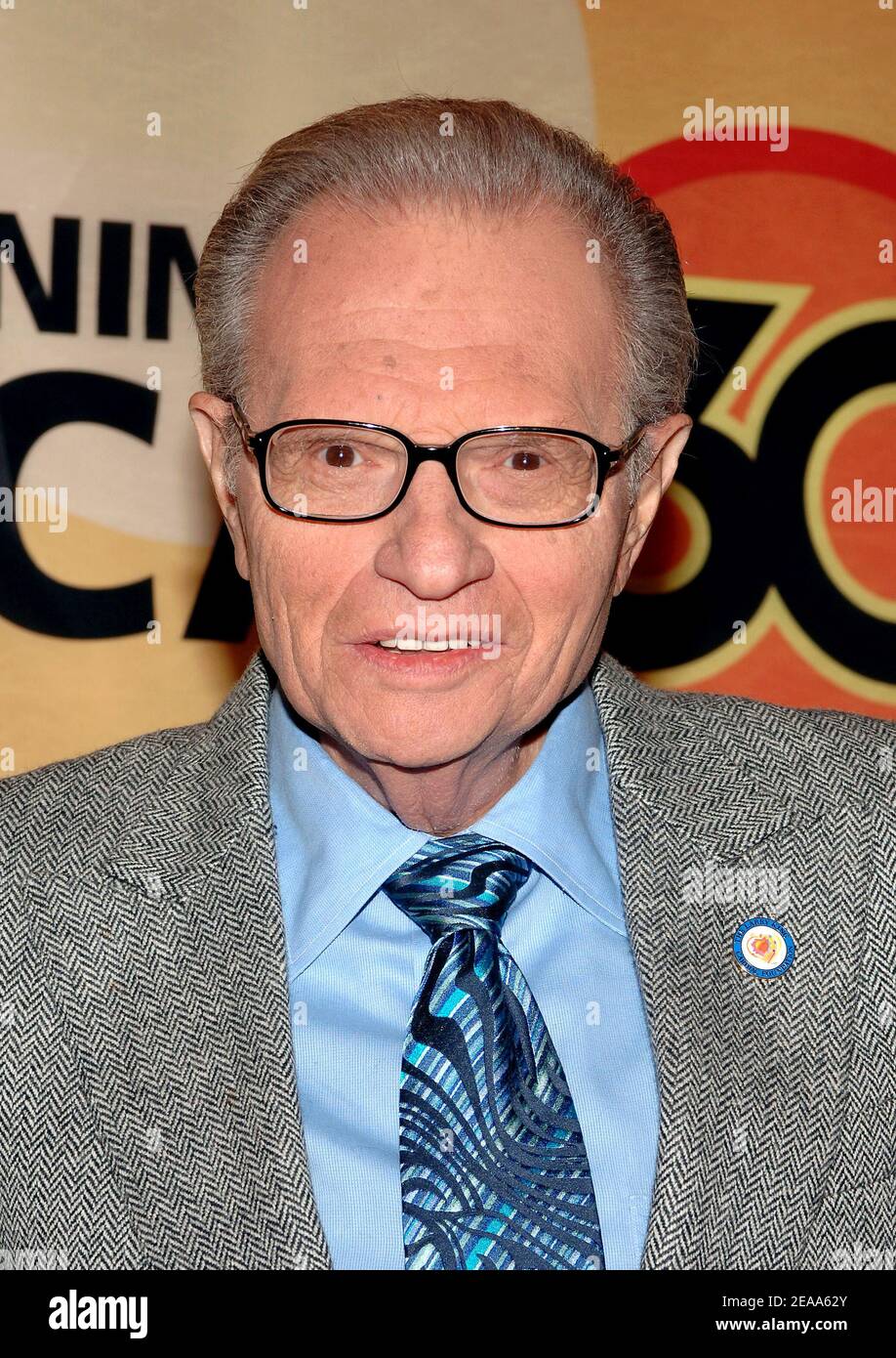 "CNN's Larry King poses for pictures as he arrives at ABC's ""Good ...