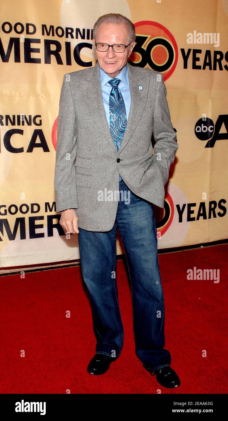 "CNN's Larry King poses for pictures as he arrives at ABC's ""Good ...