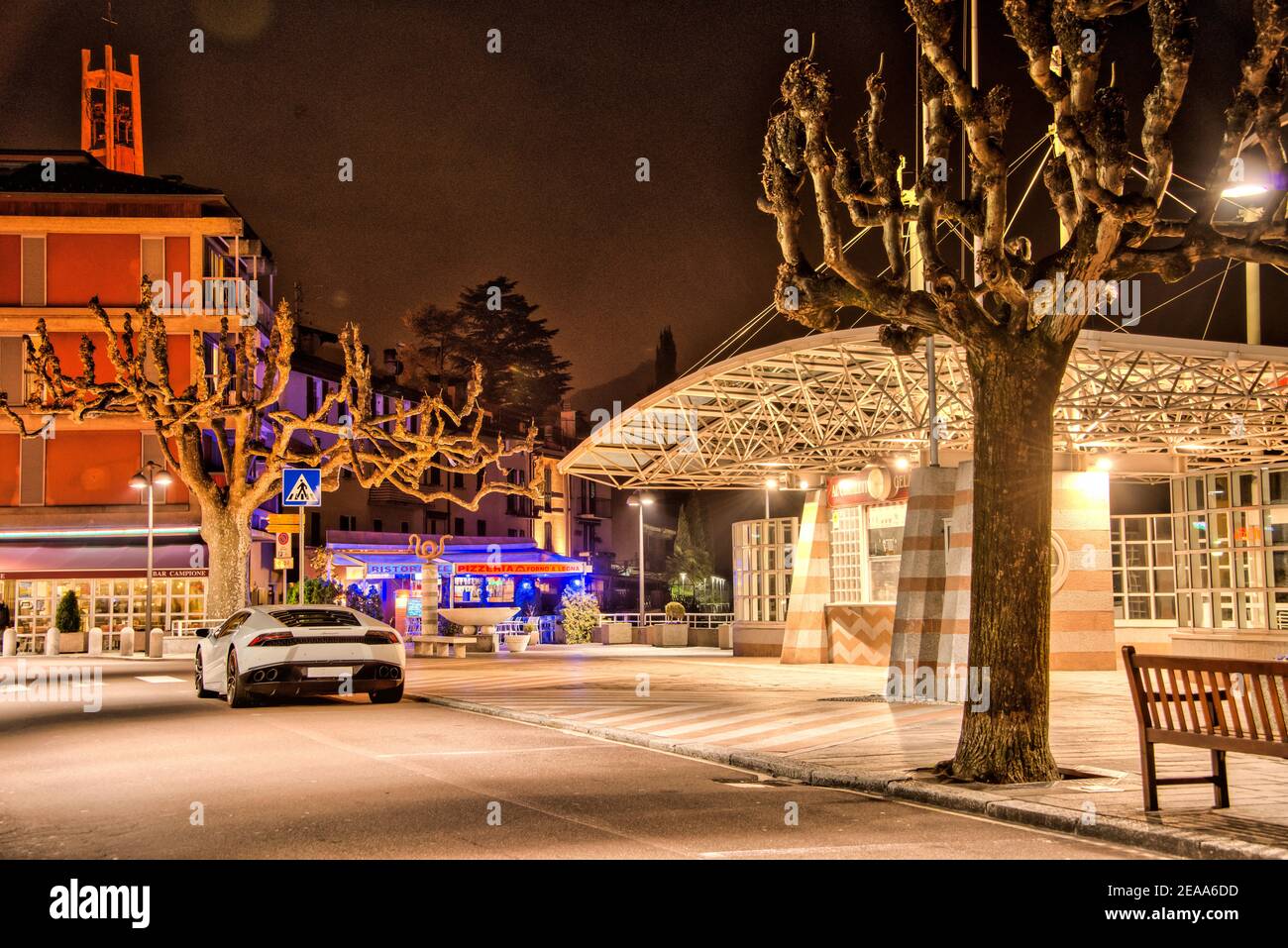 Port promenade in Campione at night Stock Photo - Alamy