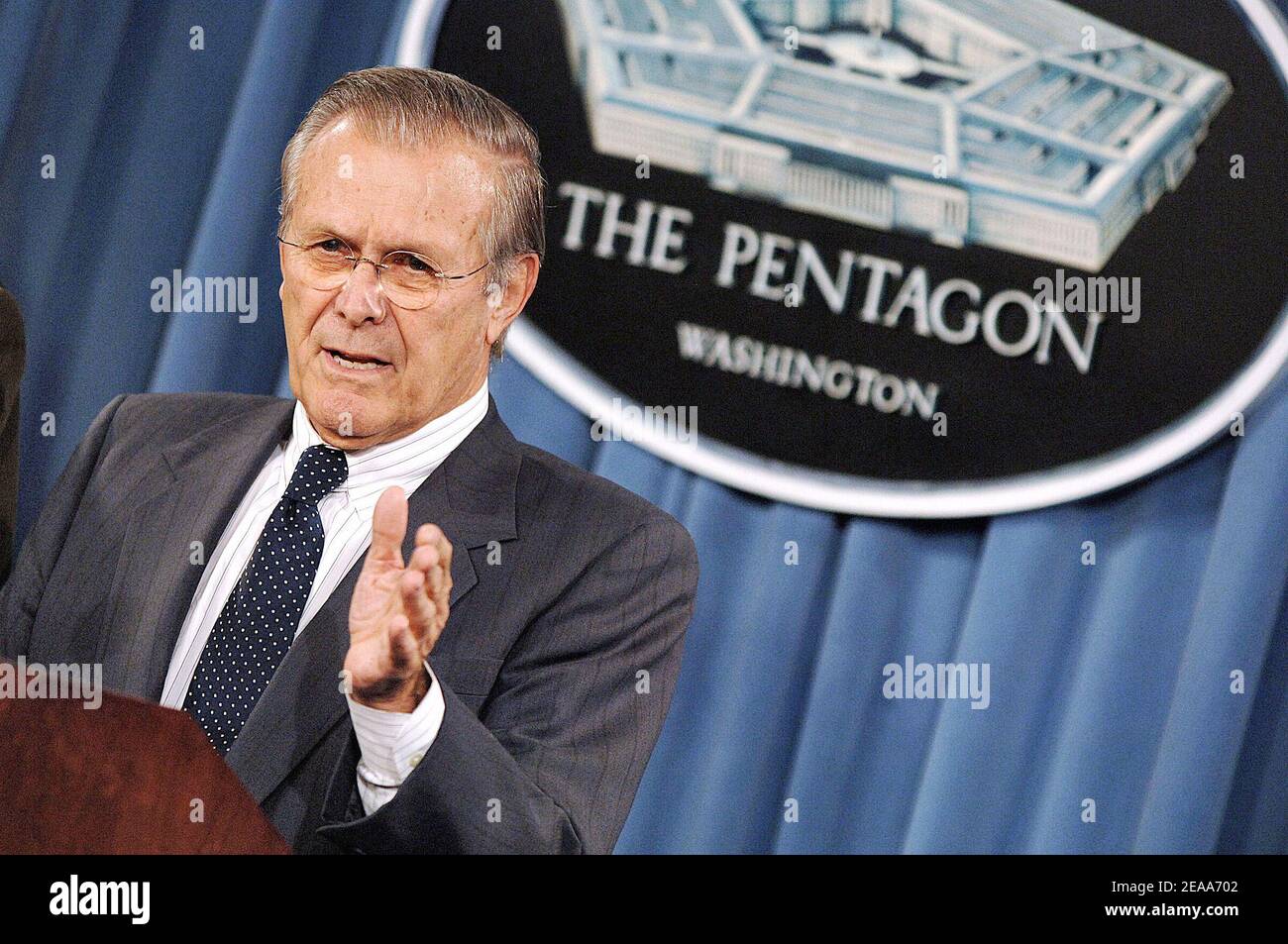 U.S. Secretary of Defense Donald Rumsfeld points to a map of North ...