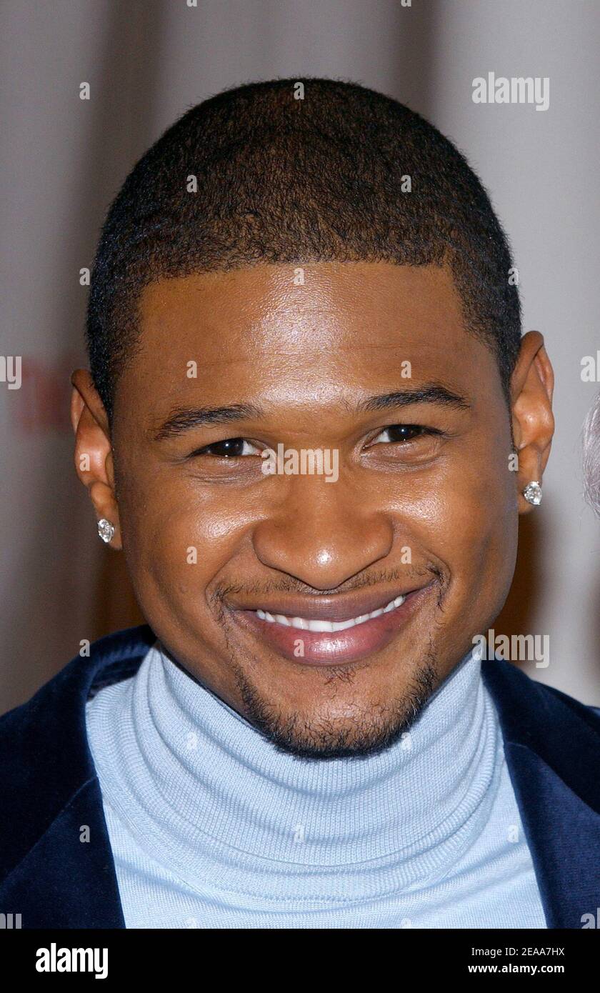 Singer Usher poses as he arrives at Keep a Child Alive's Annual 'The ...