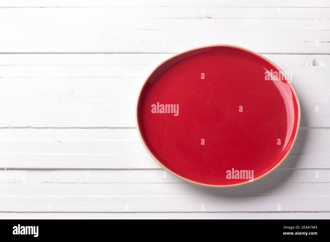 Red vintage plate on a white background, free space, horizontal Stock ...