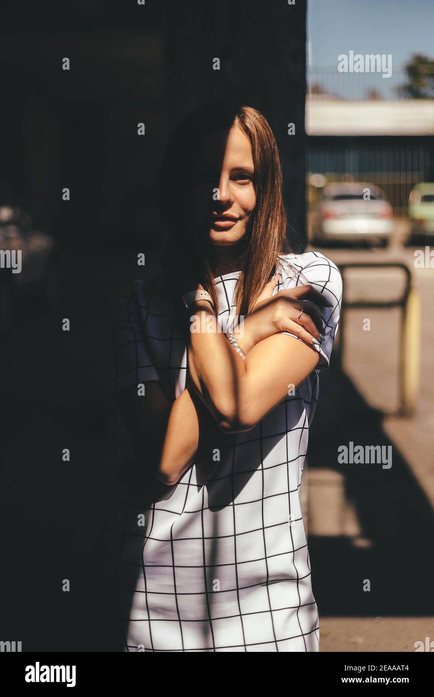 Woman crossed arms hi-res stock photography and images - Alamy