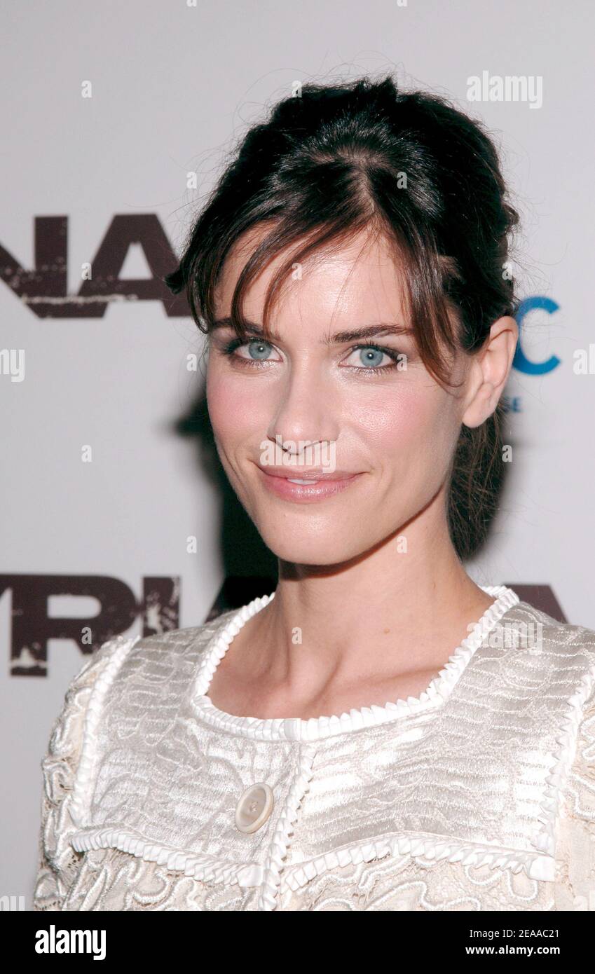 "Actress and cast member Amanda Peet poses for pictures as she arrives ...