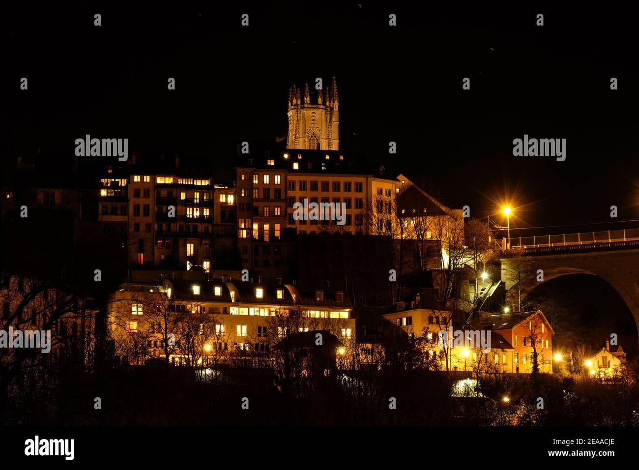 Landscape night view of the Saint-Nicolas cathedral, in Fribourg ...