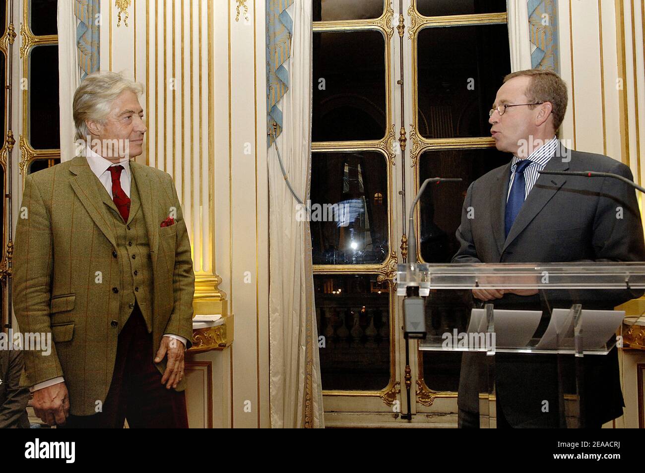 French auctioneer Pierre Cornette de Saint-Cyr (L) is awarded with the ...