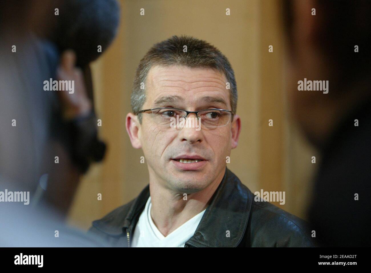 Christian Godard arrives at the court in Paris, France, on November 23 ...
