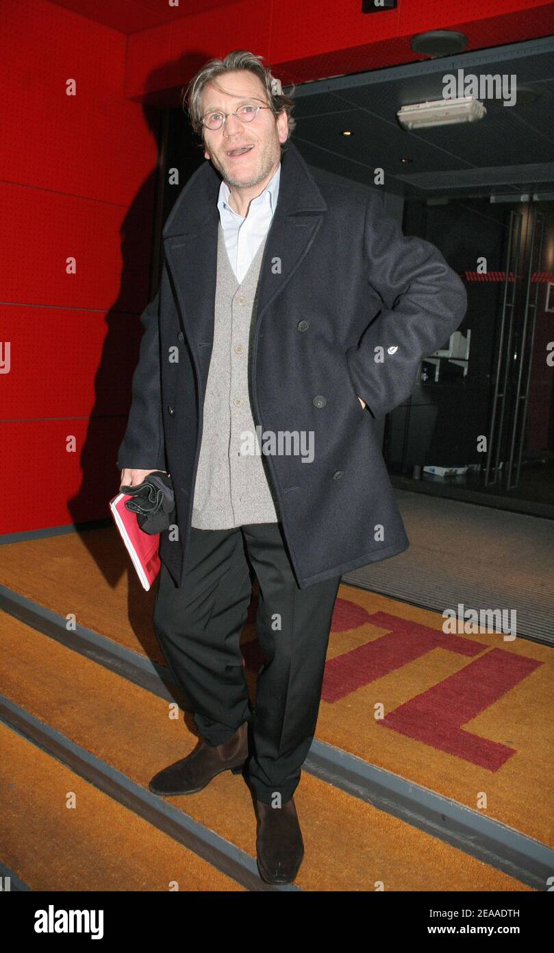 French actor Tcheky Karyo poses as he leaves the RTL studios after participating in an interview ...