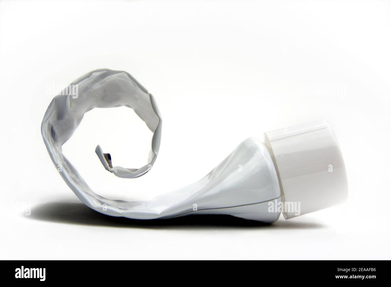 Empty toothpaste tube isolated on a white background Stock Photo - Alamy