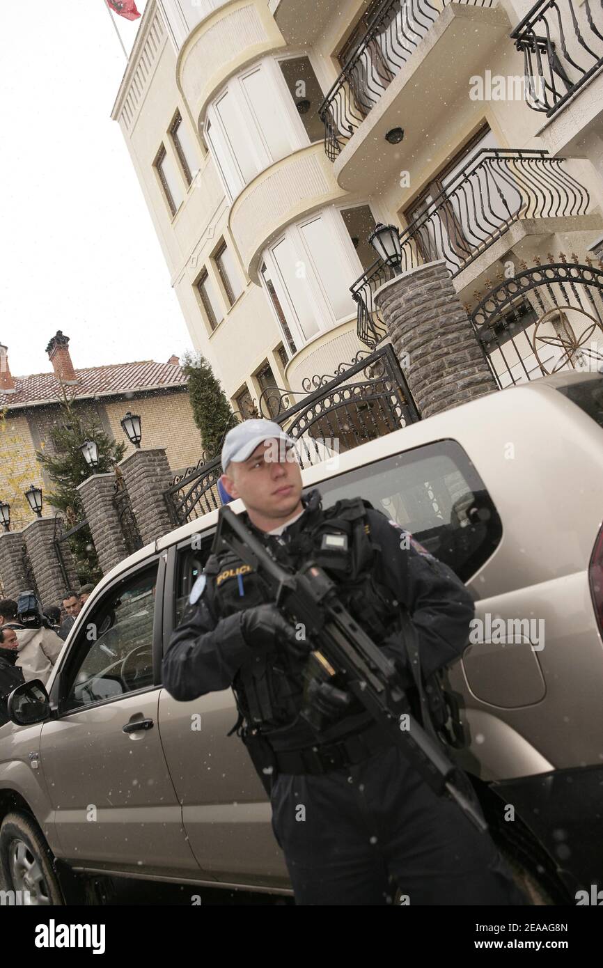An armed guard stands in front of the 'White House', official residence ...