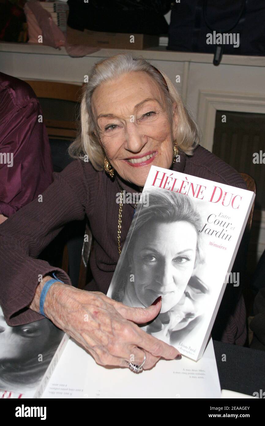 Helene Duc poses signs her latest book during the book event 'Le Livre ...