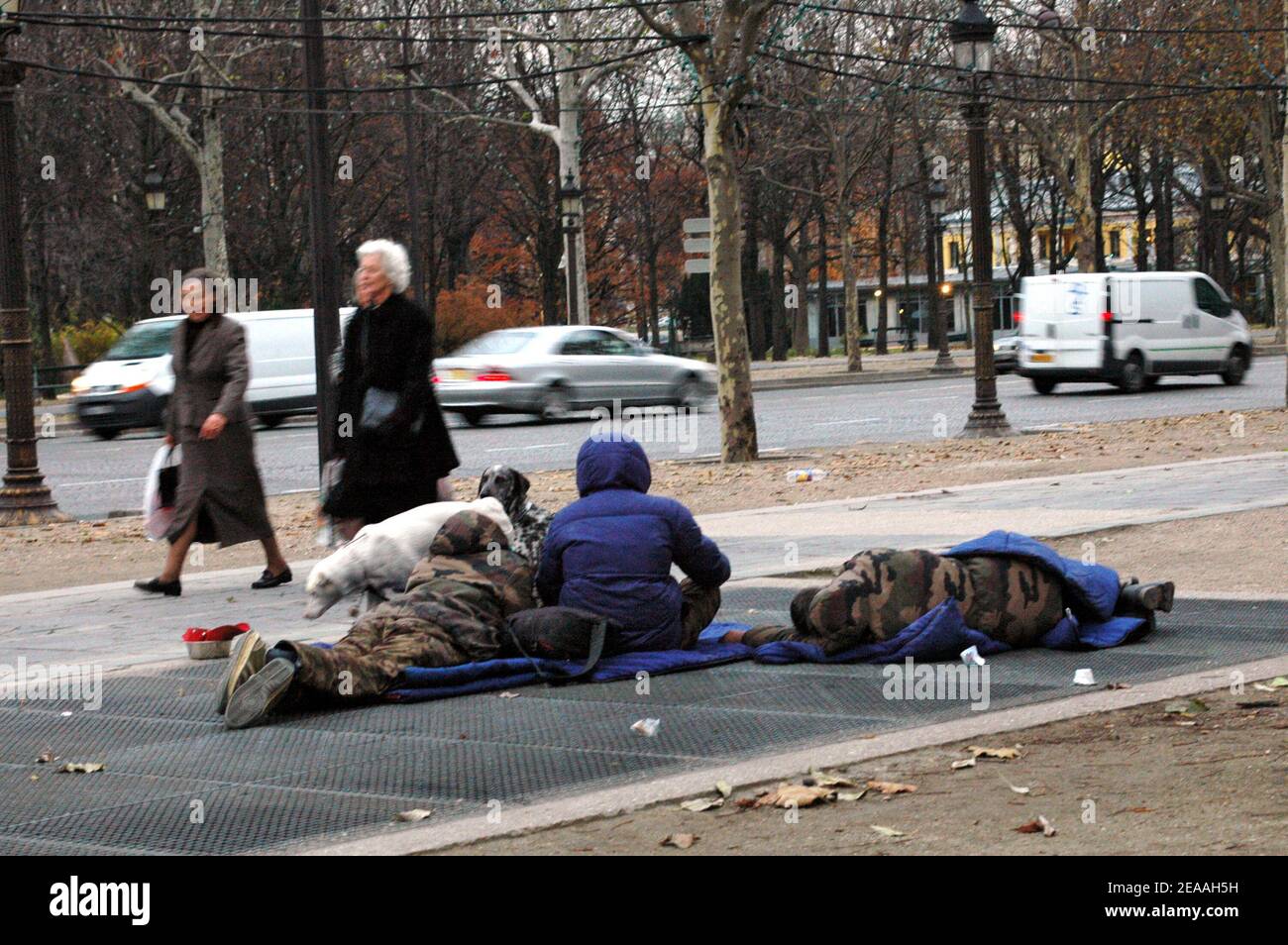 Homeless on the Champs Elysees in Paris, France on december 2005. Photo ...
