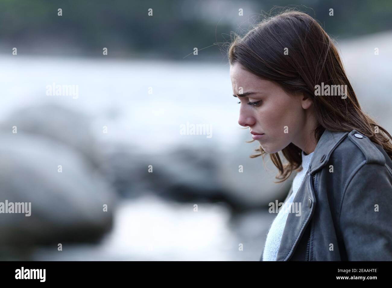 Side view sad woman hi-res stock photography and images - Alamy