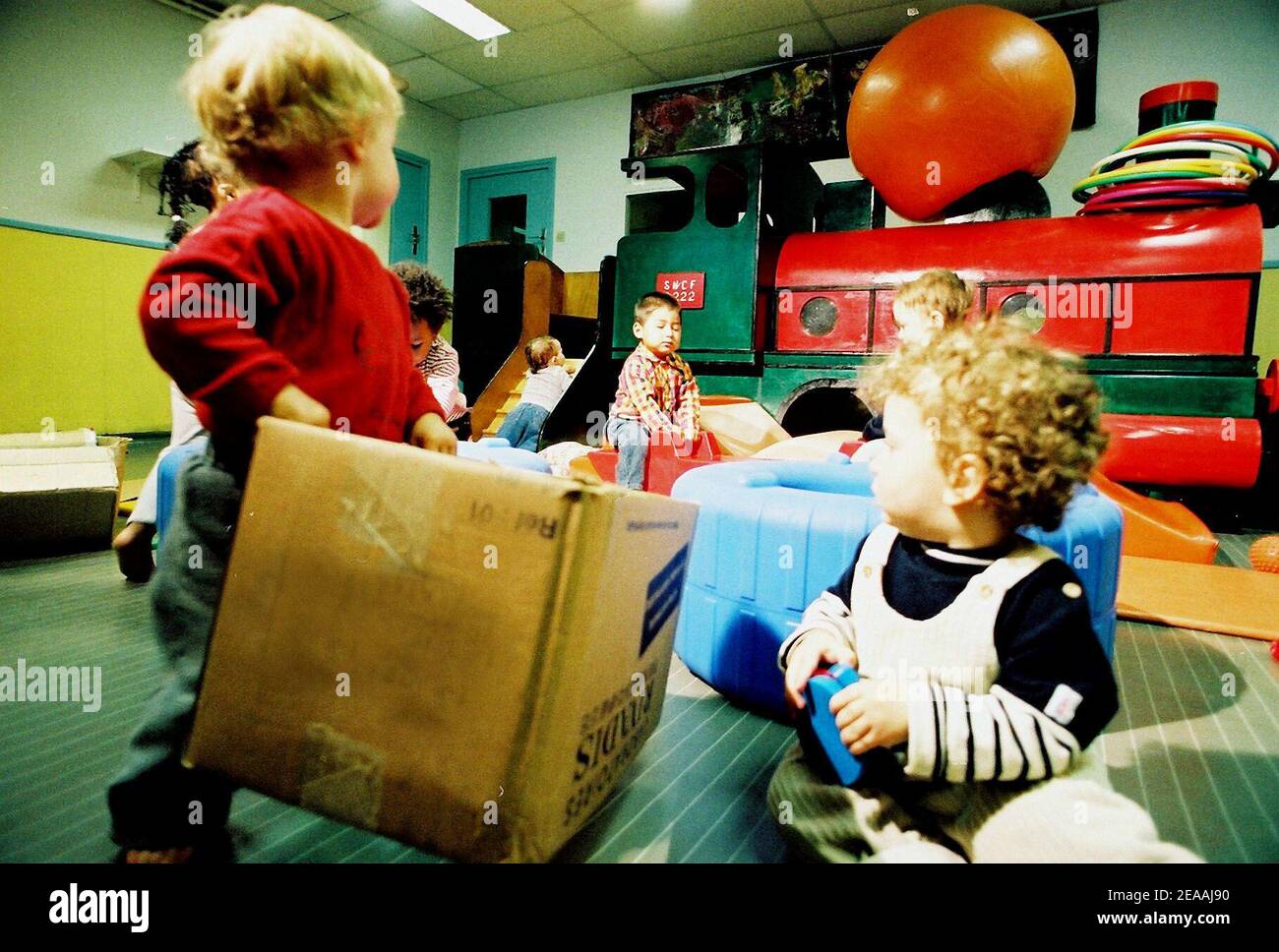 Children playing in a creche in Paris, France on december 2005. Photo ...