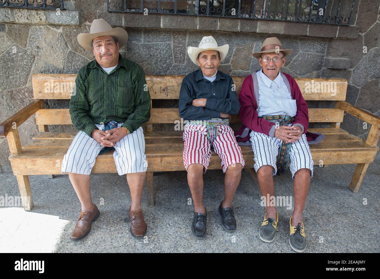 Guatemalan indigenous men in traditional hi-res stock photography and ...