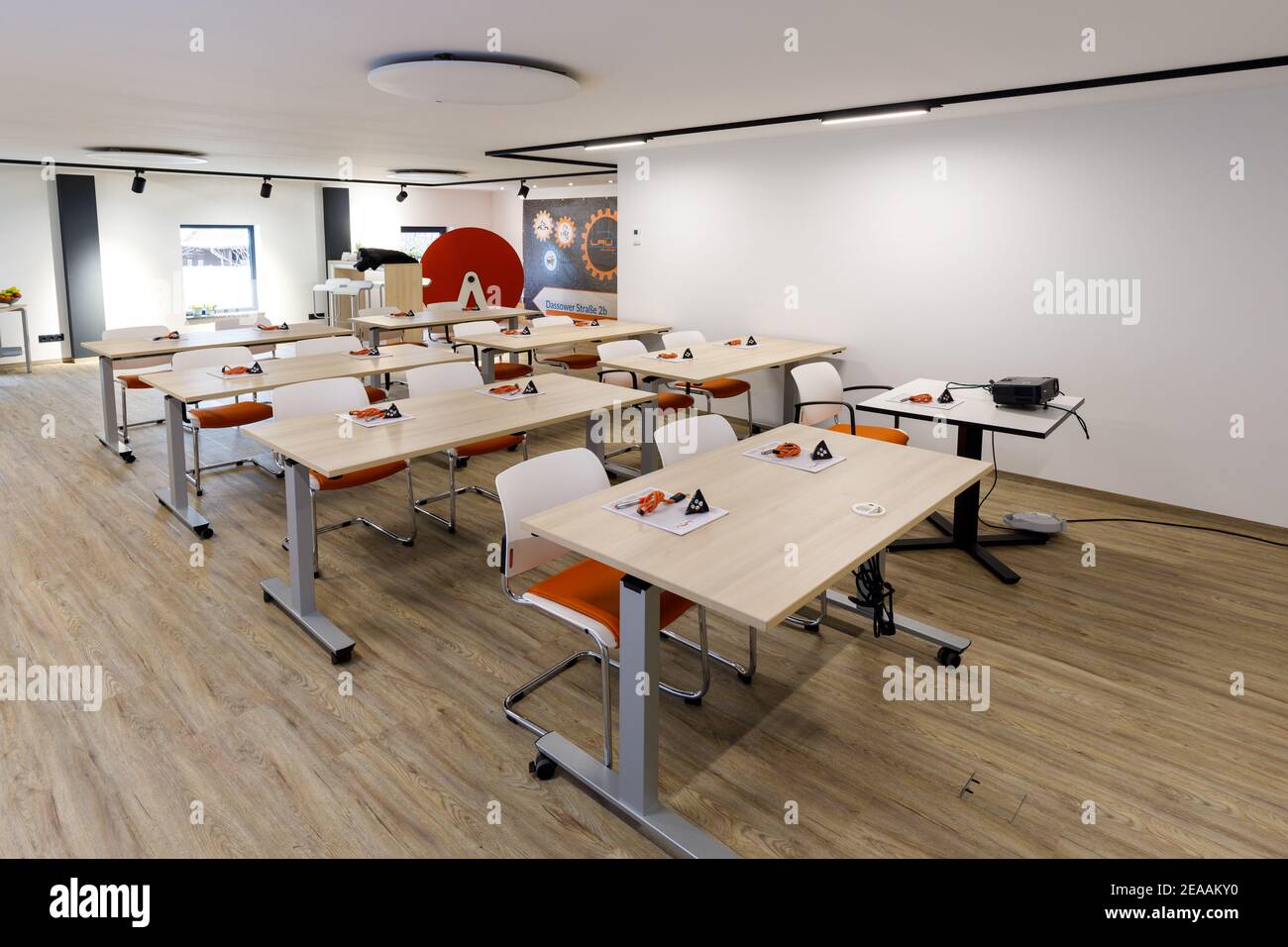 in a bright modern training room are chairs and benches Stock Photo - Alamy