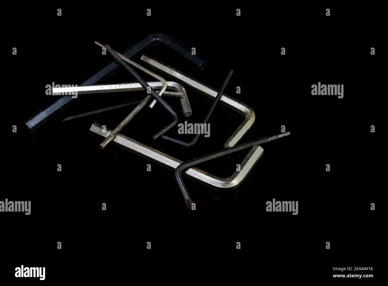 Allen keys with plain black background Stock Photo - Alamy