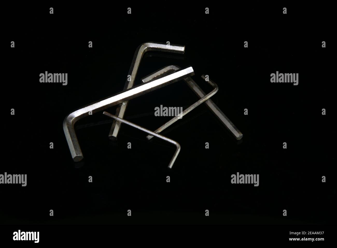 Allen keys with plain black background Stock Photo - Alamy