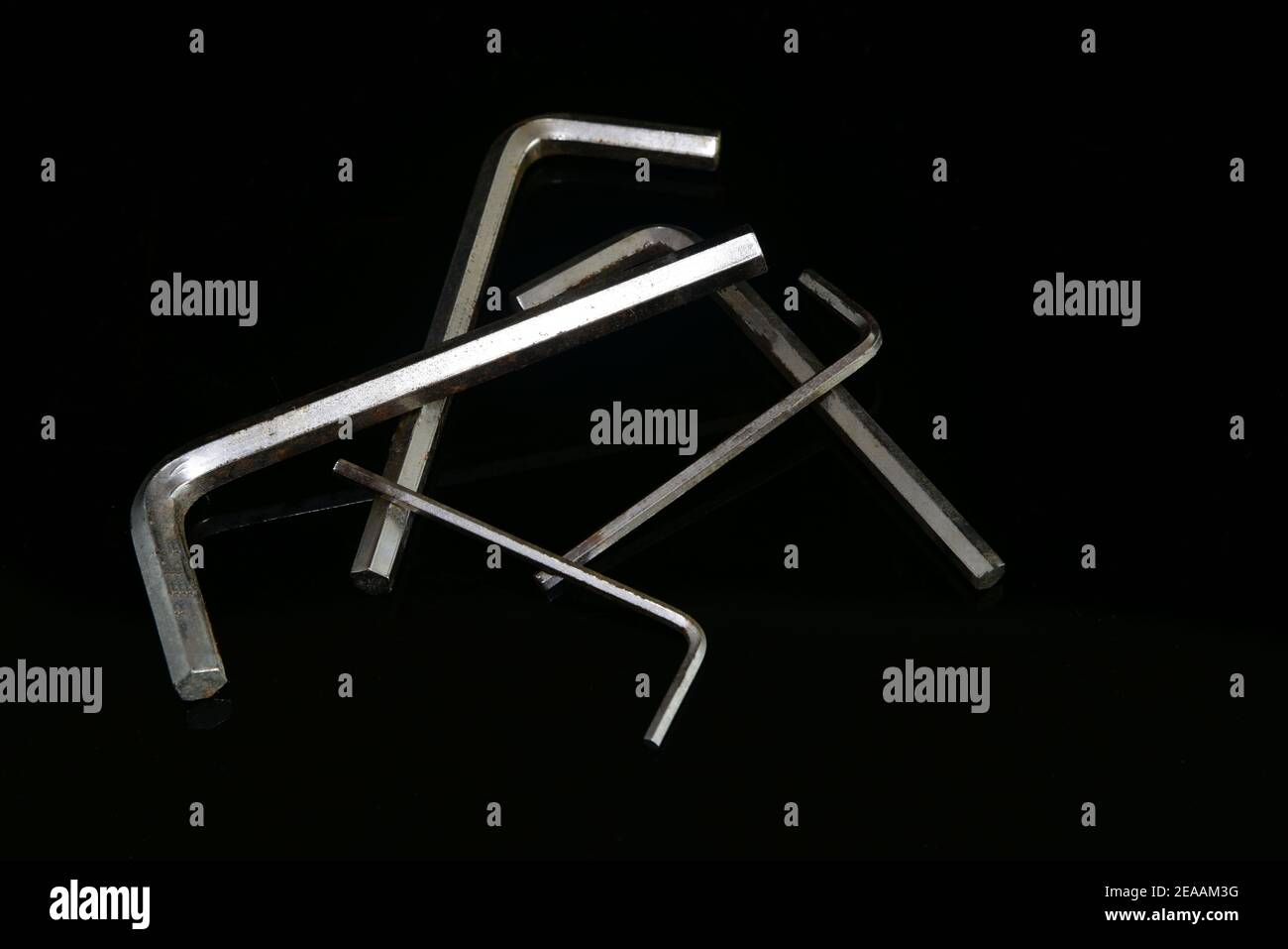 Allen keys with plain black background Stock Photo - Alamy