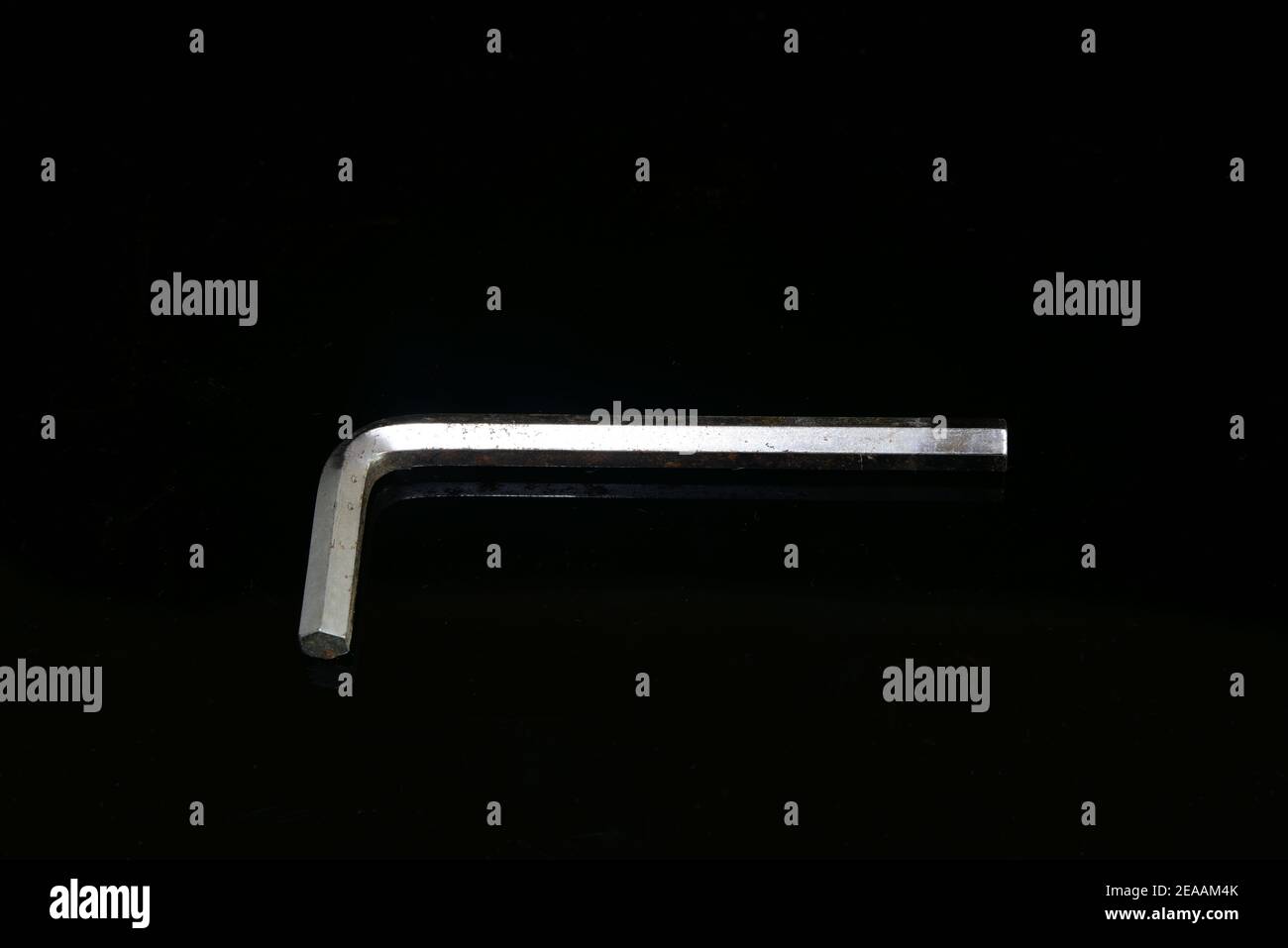 Allen keys with plain black background Stock Photo - Alamy