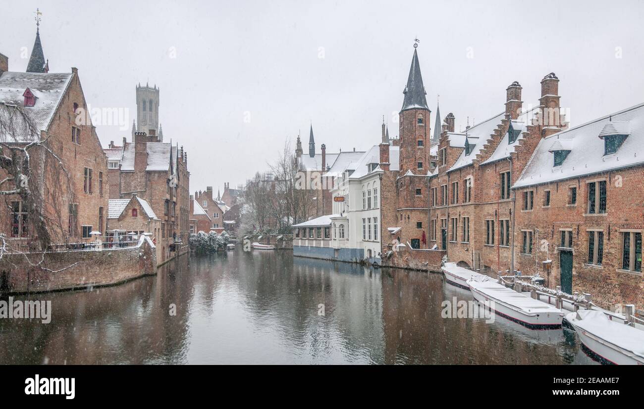 Bruges snow belfort hi-res stock photography and images - Alamy
