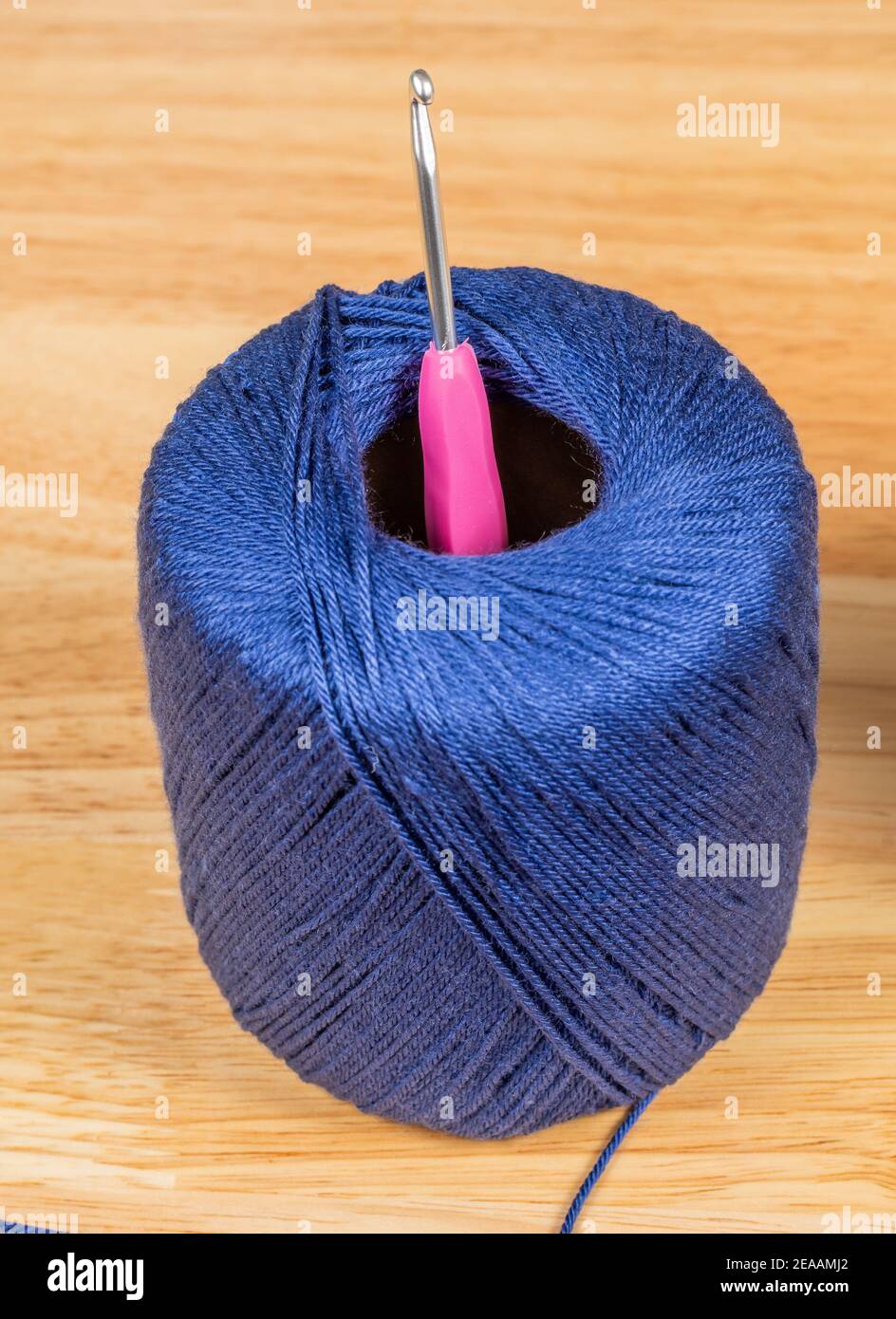 blue wool bud detail with pink crochet hook Stock Photo - Alamy