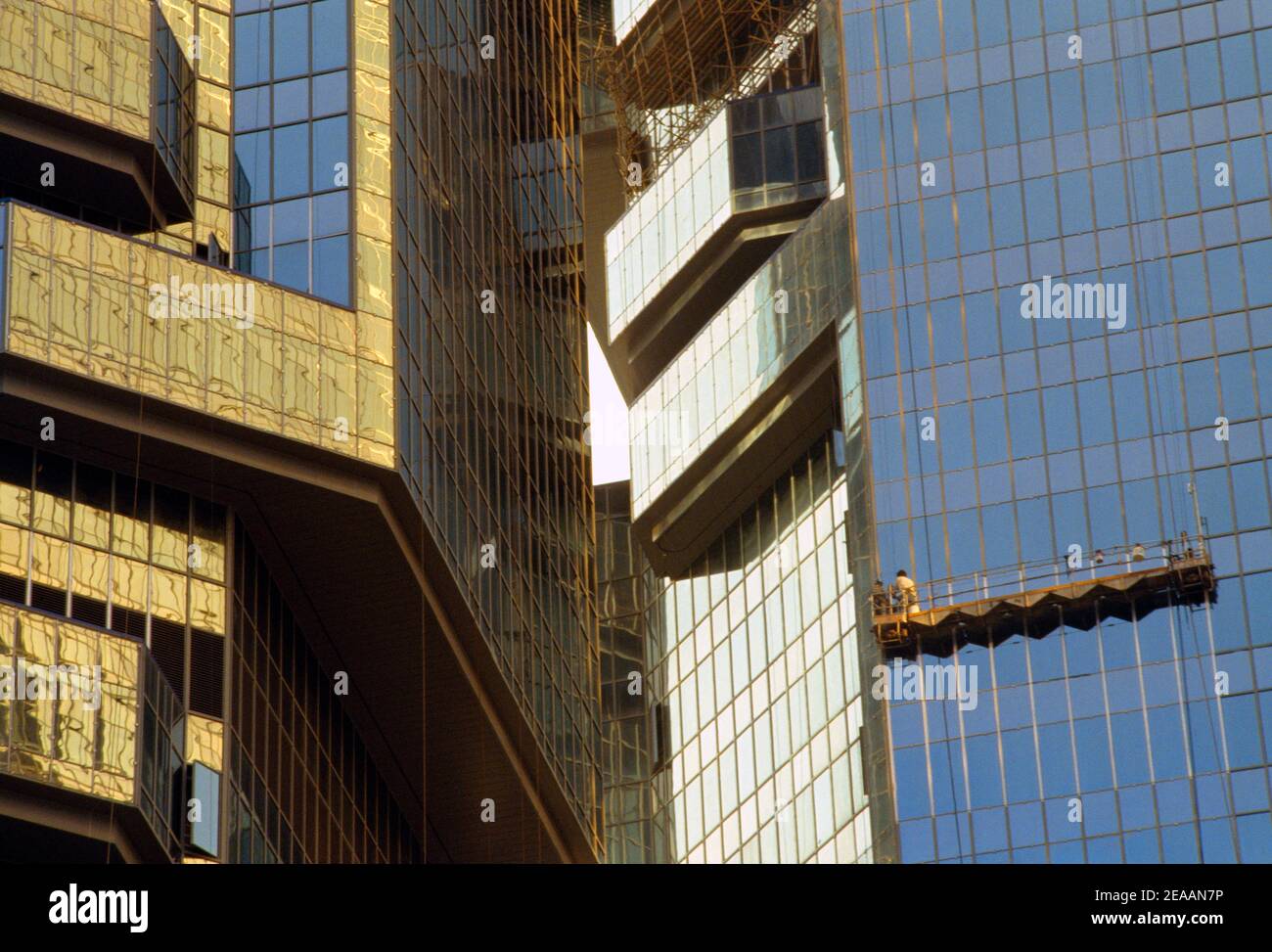 Taiwan Building With Cradle Windows Being Cleaned Stock Photo - Alamy