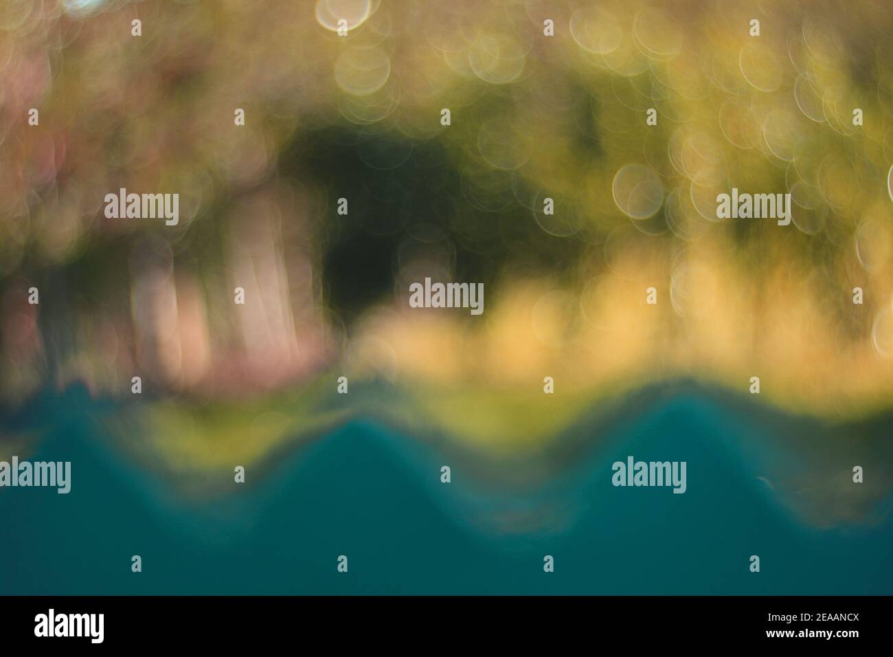 View over the garden fence Stock Photo - Alamy