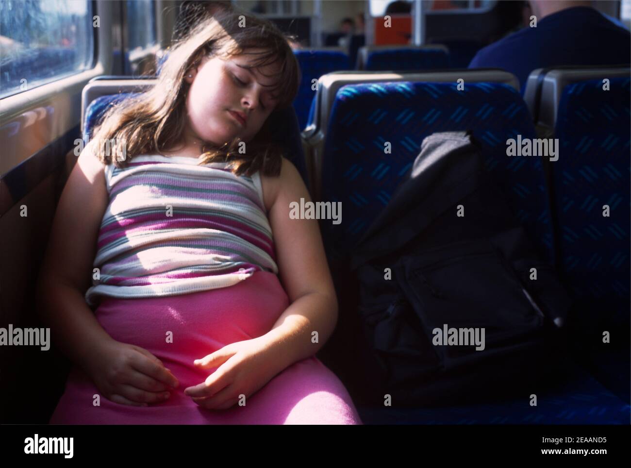 Girl sleeping on train hi-res stock photography and images - Alamy