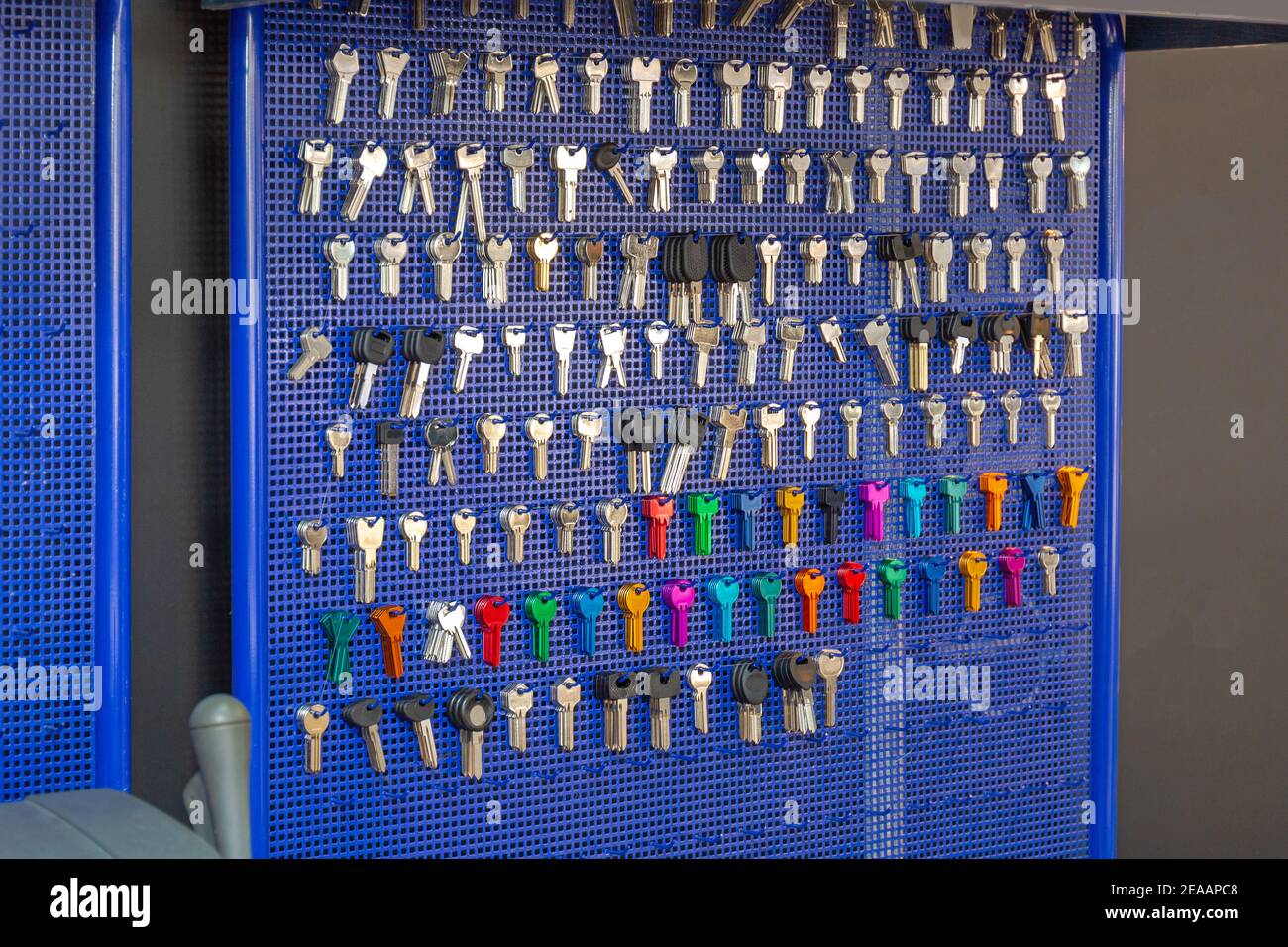 Blank Keys at Wall Shelf Locksmith Workshop Stock Photo - Alamy