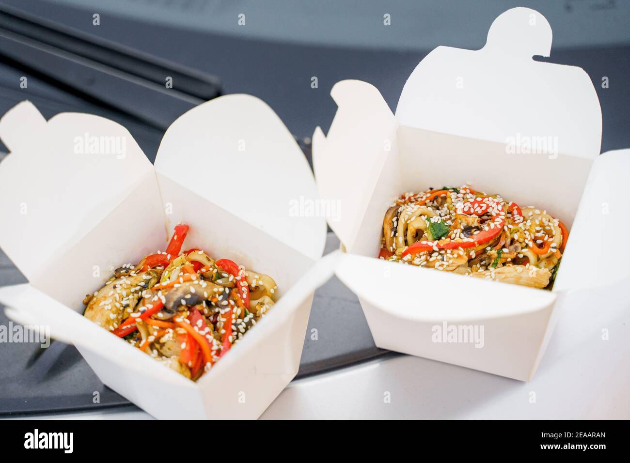 Wok boxes hi-res stock photography and images - Alamy