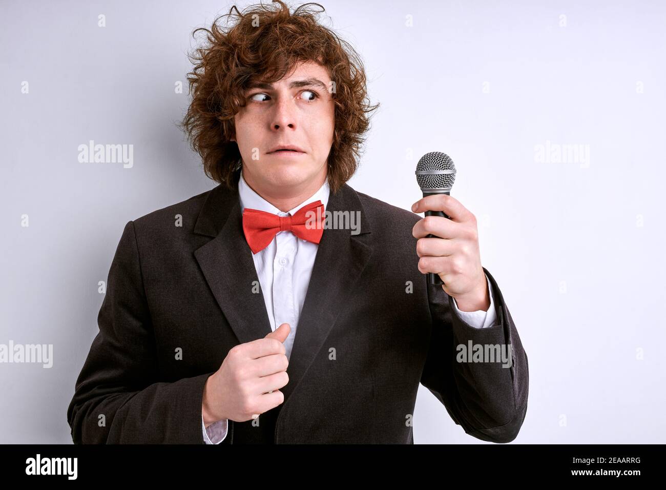 nervous man is afraid of public speech and sweating isolated on white ...