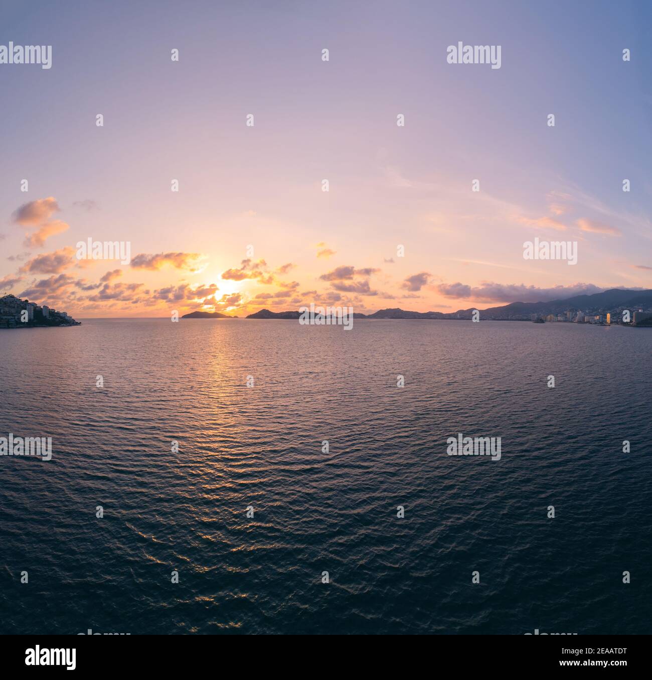 Calm scenery of the sea with a beautiful sunset background Stock Photo ...