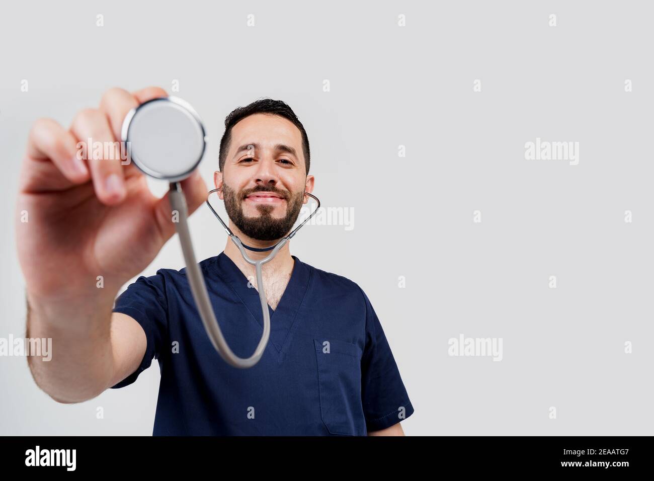 Medical arabian student does auscultation to patient. Doctor uses ...