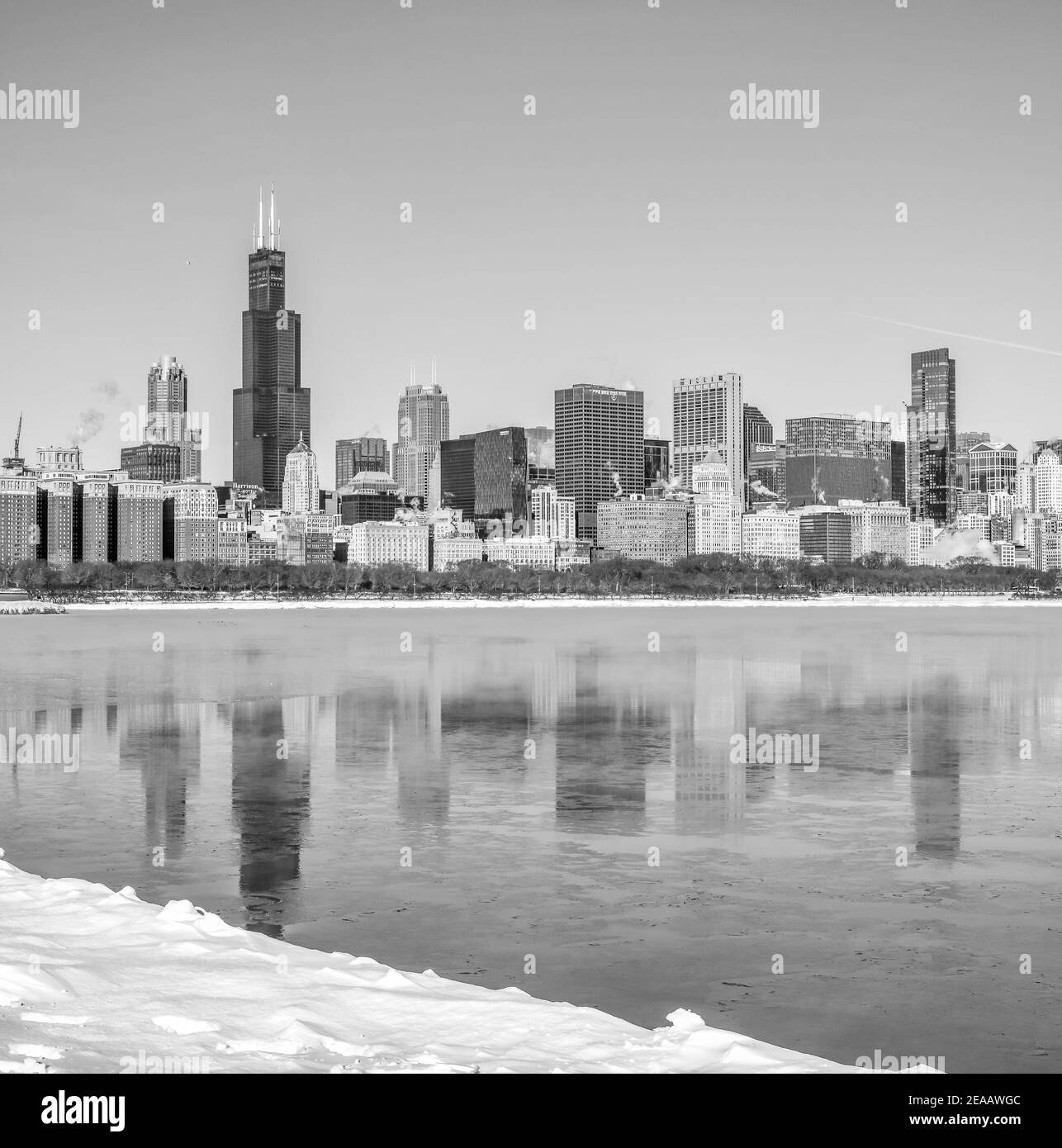 Chicago city skyline along frozen lakeshore in winter Stock Photo - Alamy