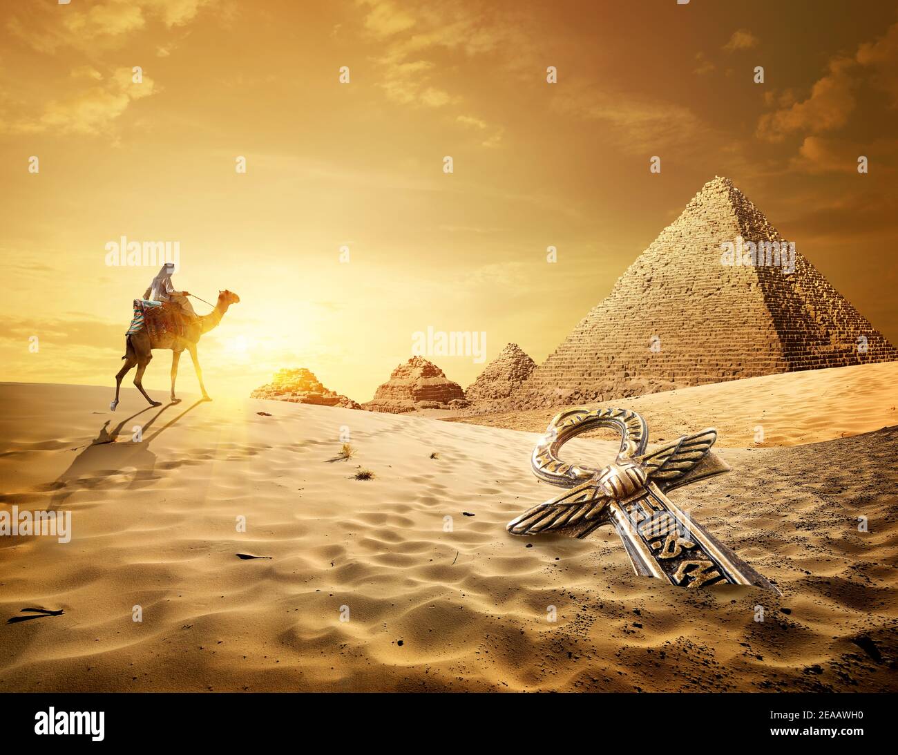 Bedouin on camel near pyramids and ankh in desert Stock Photo - Alamy
