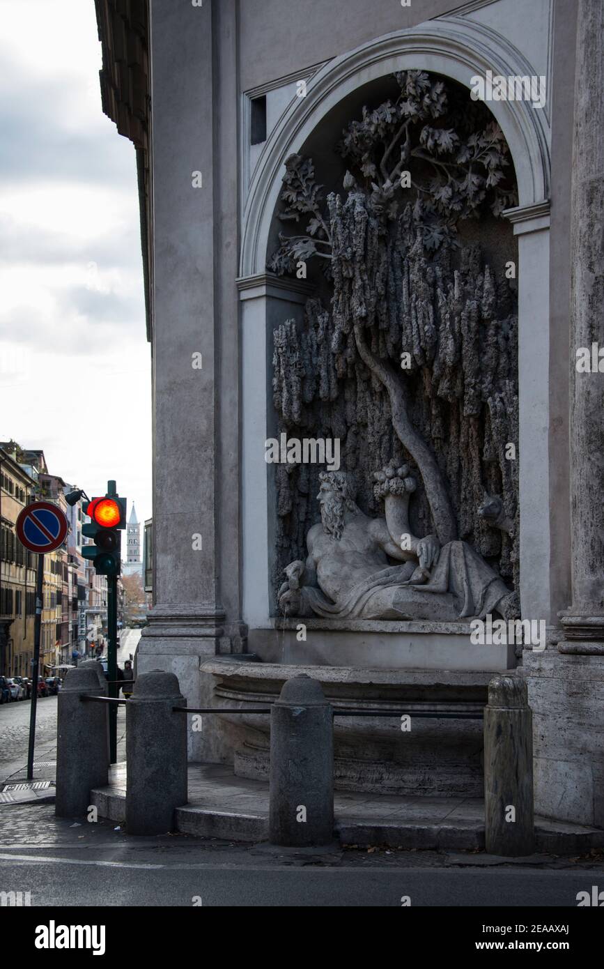 Street corner with relief and red traffic light, Rome Stock Photo - Alamy
