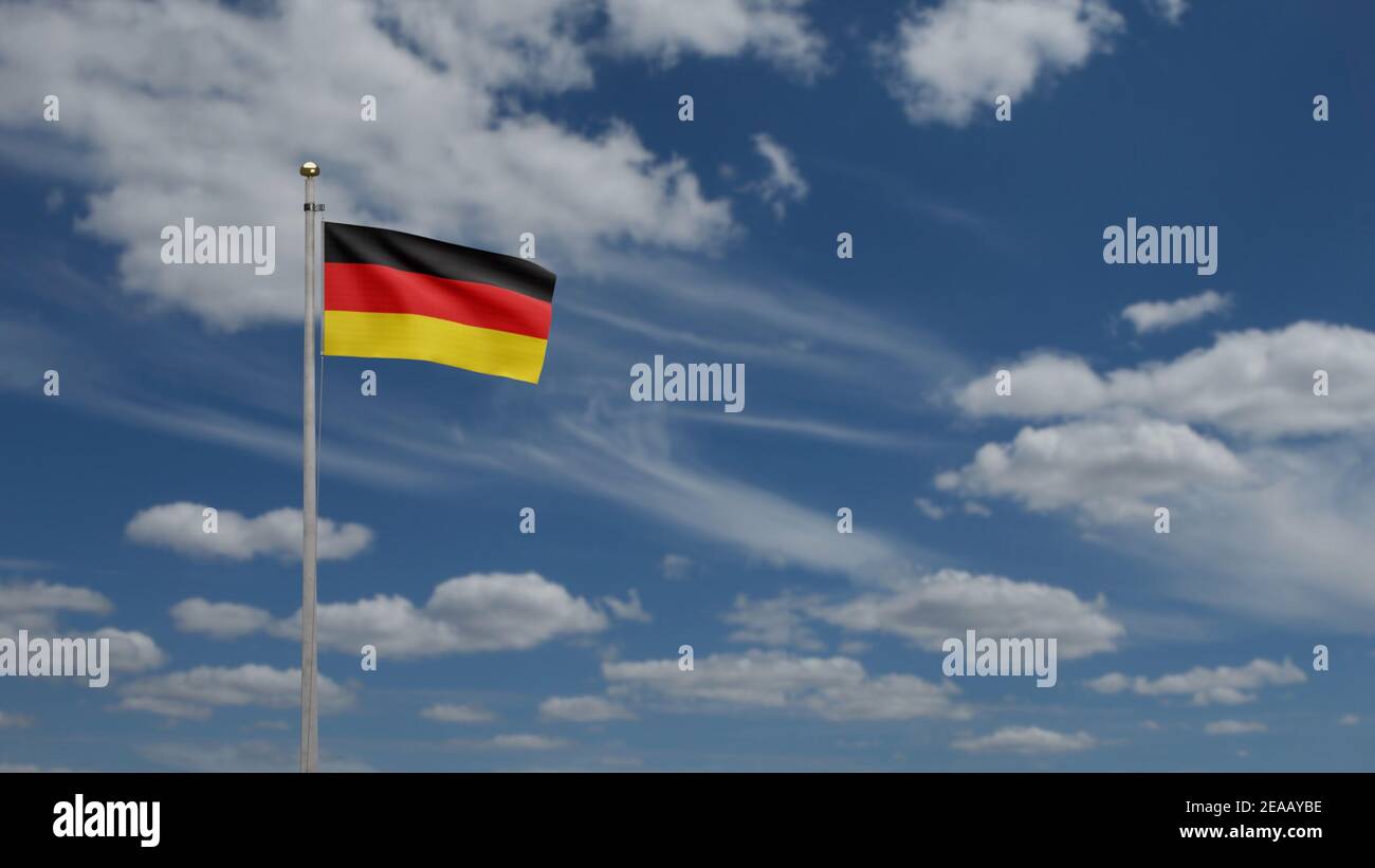 German flag waving in wind with blue sky. Close up of Germany banner ...