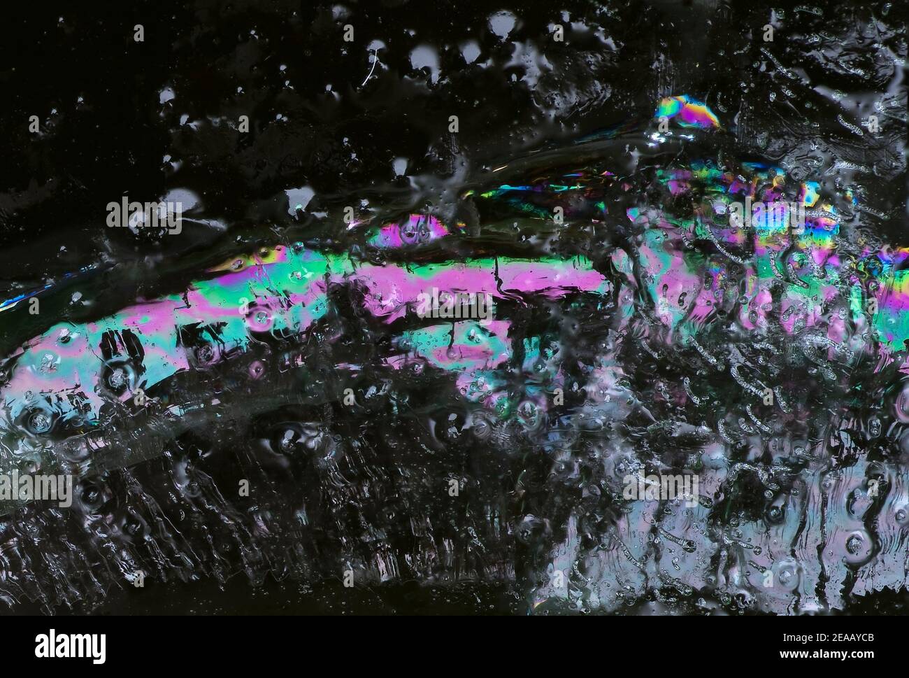 Close-up, structure on ice, shimmering spectrum Stock Photo - Alamy