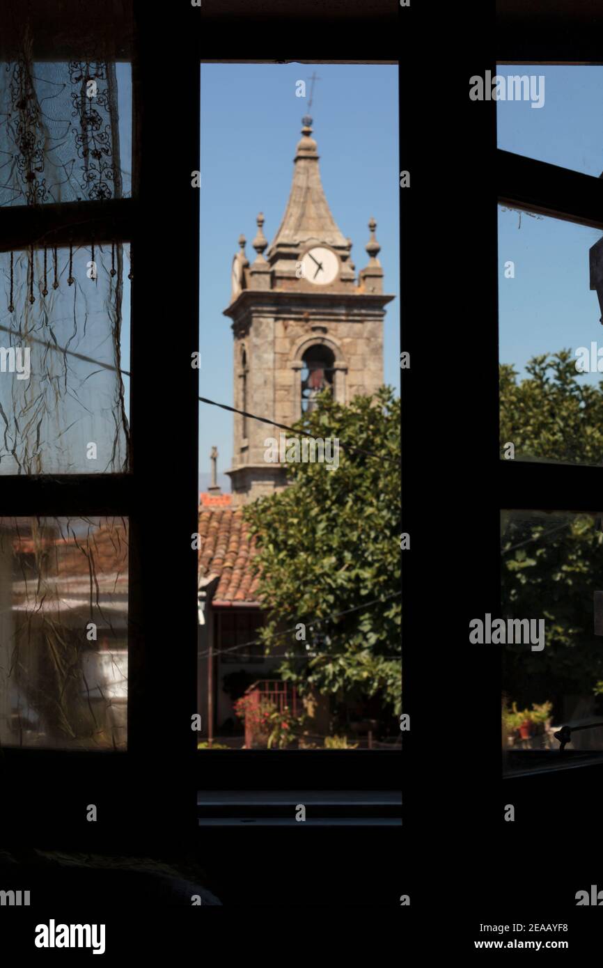 Wide open window with view to the church tower Stock Photo - Alamy