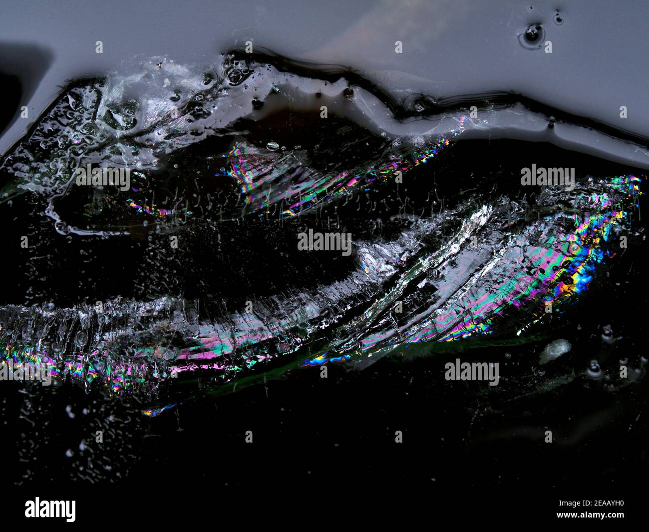 Close-up, structure on ice, shimmering spectrum Stock Photo - Alamy