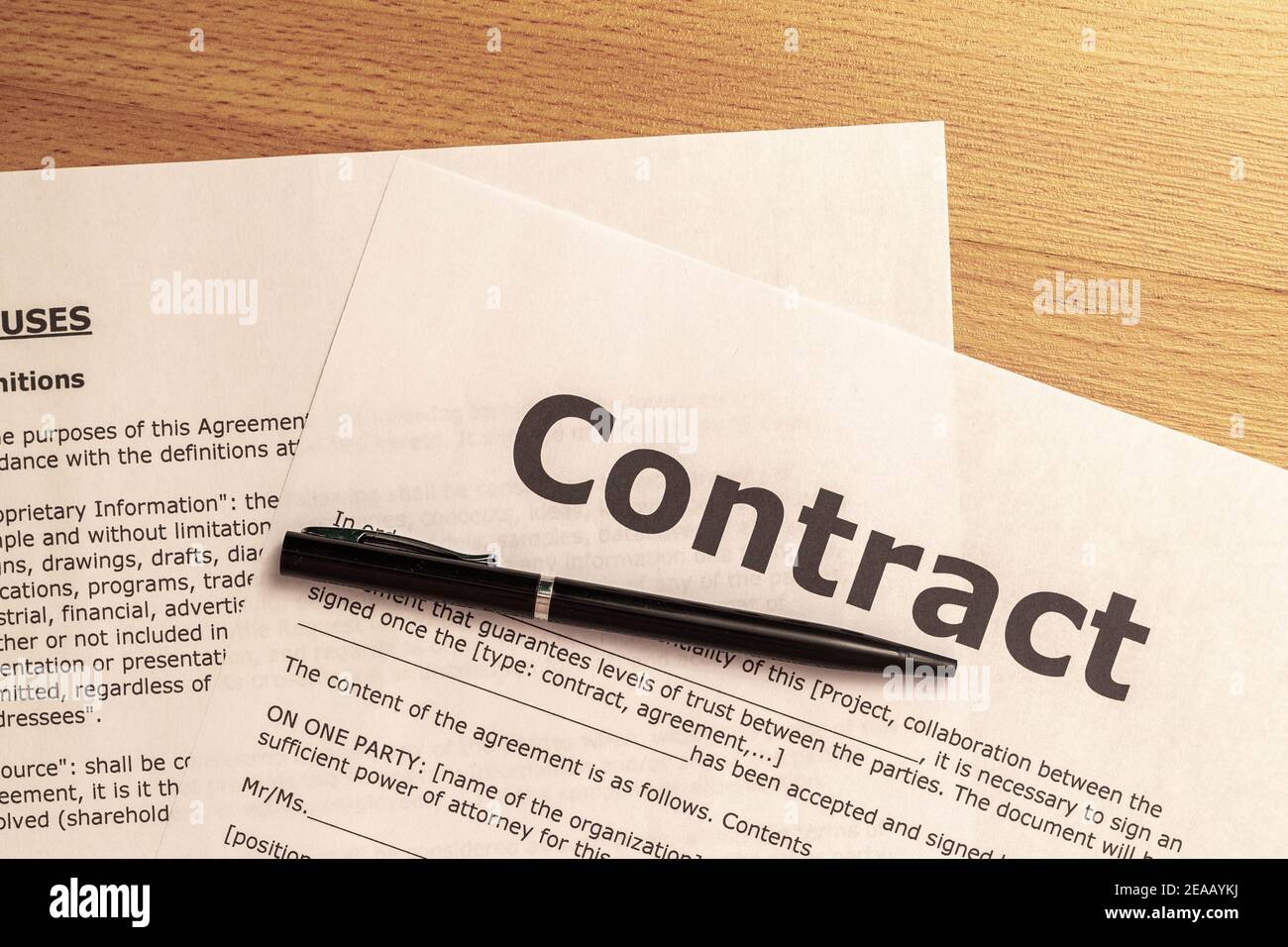detail of a drafted contract ready to be filled out and signed by a ...