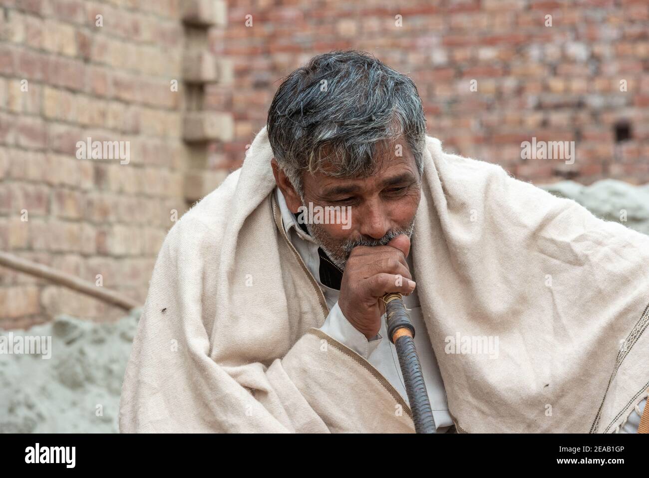Man Smoking Hookah, Rural Life, Punjab, Pakistan Stock Photo - Alamy
