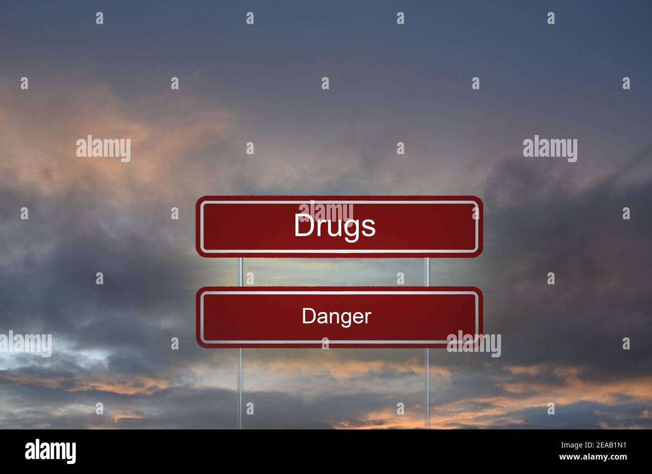 Red Drugs and Danger road sign with the dark sunset sky in the ...