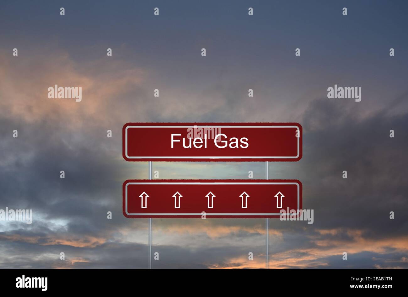 Red Fuel gas road sign with the dark sunset sky in the background Stock ...