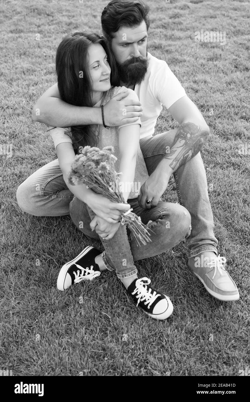 Carefree couple in love cuddling relax in park, tender hug concept ...