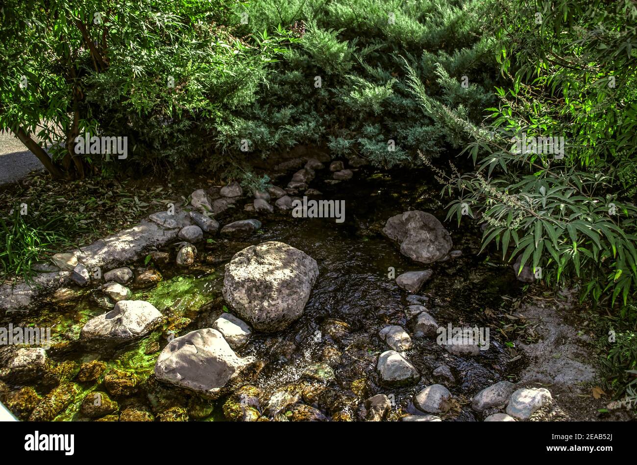 An artificial stream that flows through the entire park with rocky ...