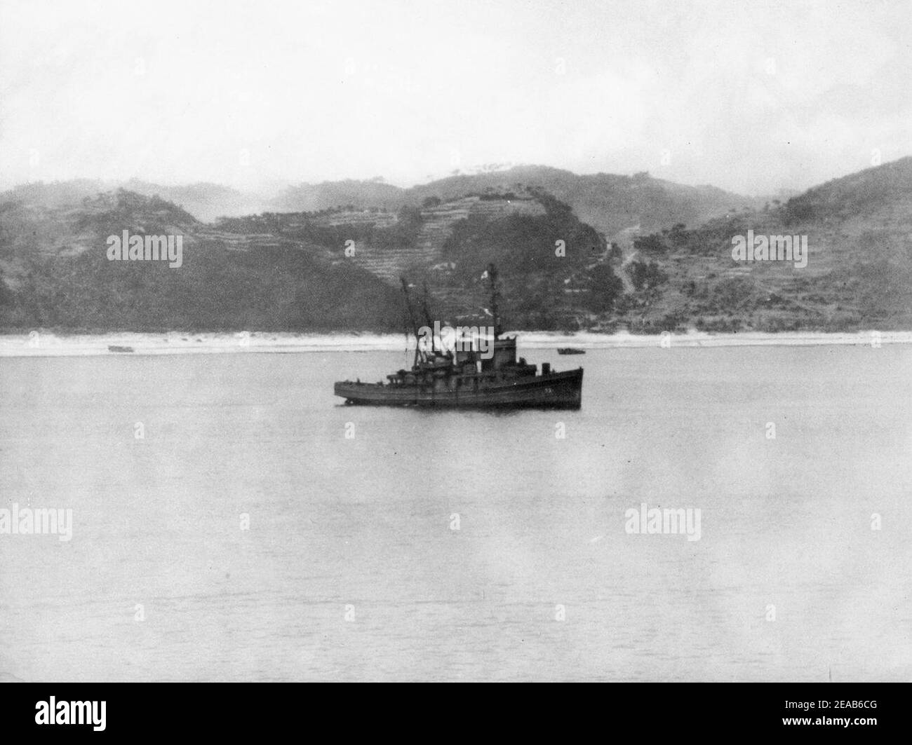 Navajo-class tugboat off Okinawa in 1945 Stock Photo - Alamy