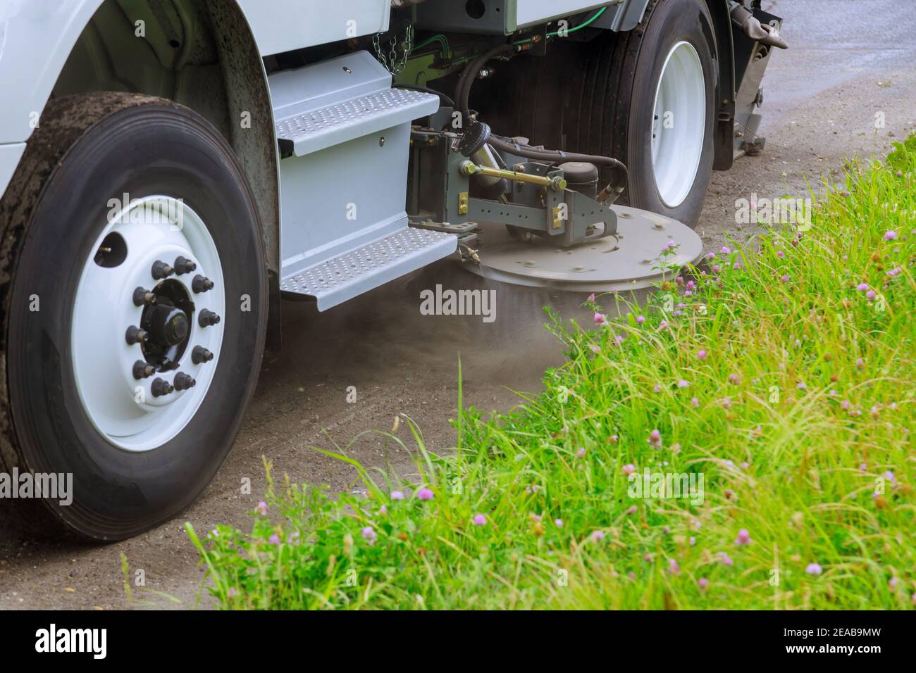 Machines wash asphalt hi-res stock photography and images - Alamy